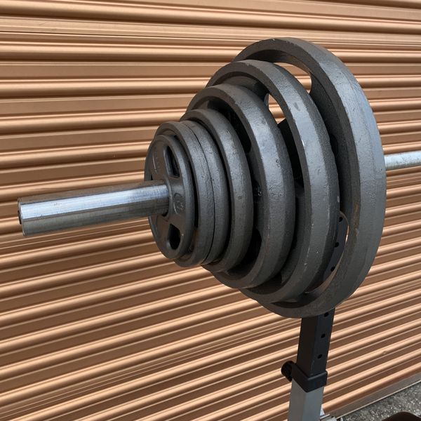 Weider 300 Lb Olympic Weight Set With 45 Lb Barbell Excellent weider-300-lb-olympic-weight-set-with-45-lb-barbell-excellent