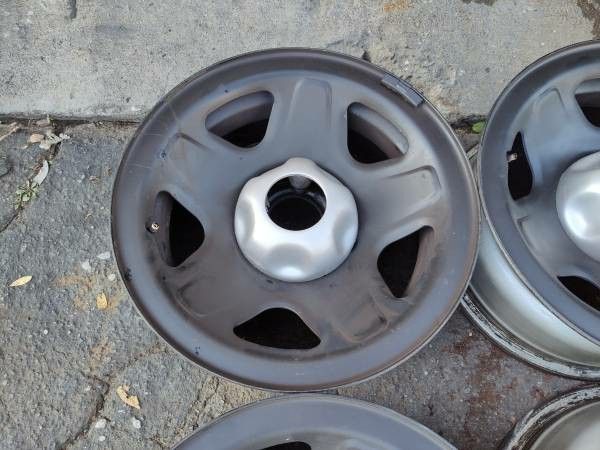 Steel Ford Ranger 15 inch rims with caps 5 on 4.5 for Sale in ...